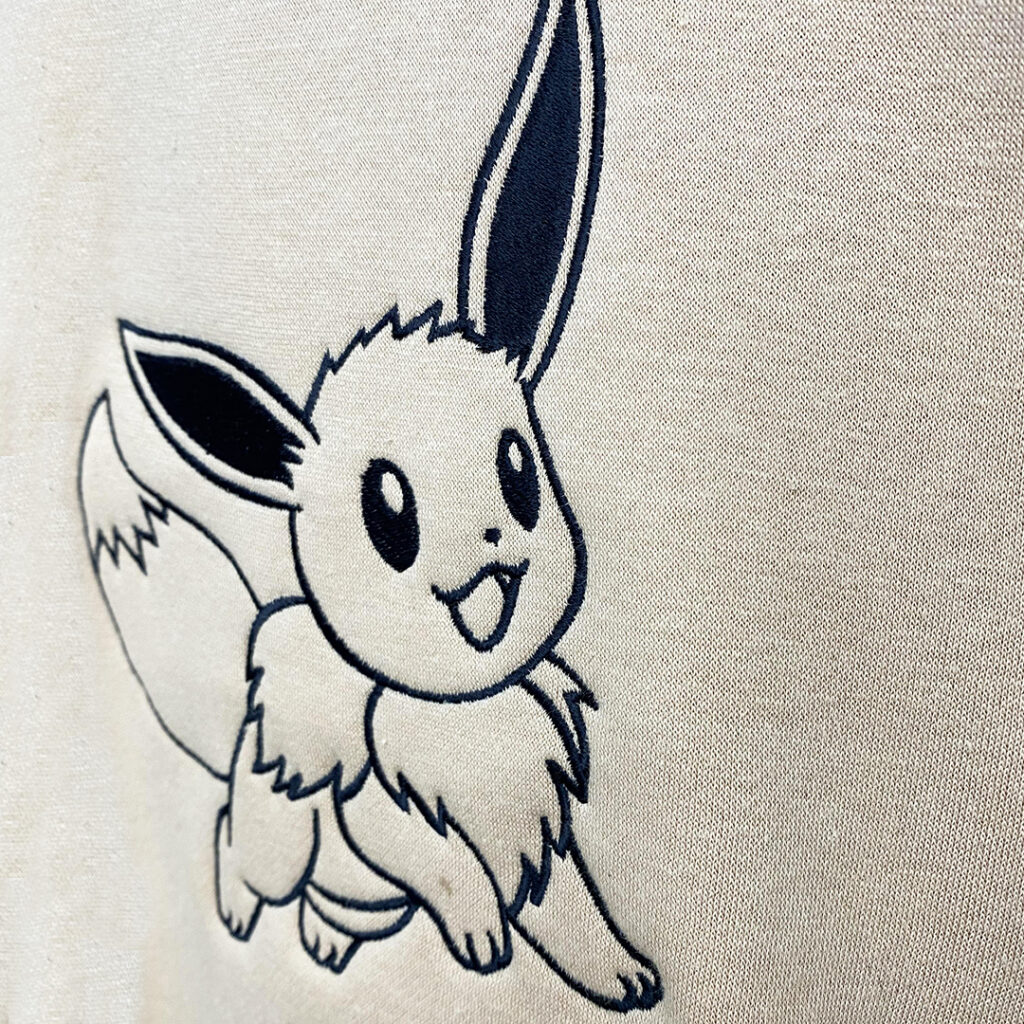 Pokemon Eevee Tan Hoodie – Embroidered Eevee – Champion Hiro